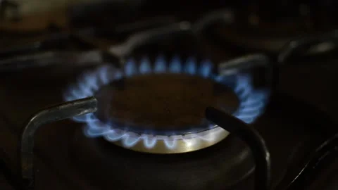 blue fire gas methane on a kitchen stove... | Stock Video | Pond5