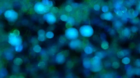 Blue glitter background in slow motion | Stock Video | Pond5