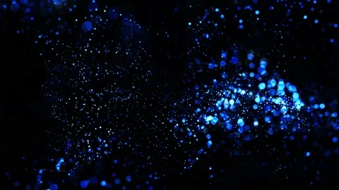 blue glowing particles circle in the air... | Stock Video | Pond5