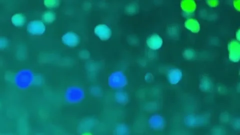 blue green bokeh glitter sparkle backgro... | Stock Video | Pond5