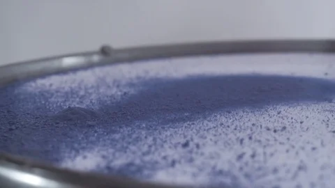 Blue holi powder bounces off drum in sho... | Stock Video | Pond5