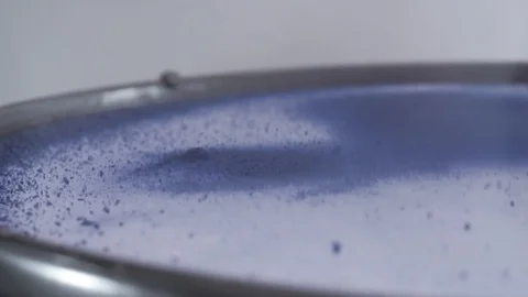 Blue holi powder bounces off drum in sho... | Stock Video | Pond5