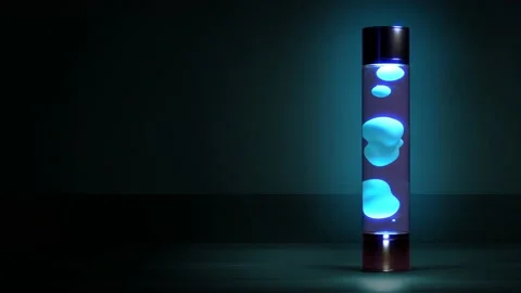 Blue lava lamp on dark background with f... | Stock Video | Pond5
