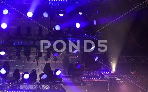 Blue light on a rock concert stage as background Stock Image #117427111