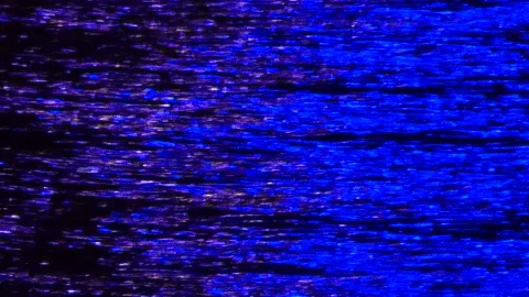 Blue neon light on seawater at night bac... | Stock Video | Pond5