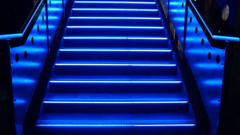 Blue neon stairs in the entrance to a ni... | Stock Video | Pond5