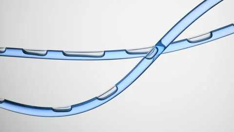 Blue oil is flowing in two connecting tu... | Stock Video | Pond5