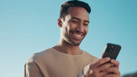 Blue sky, phone and young man typing a t... | Stock Video | Pond5