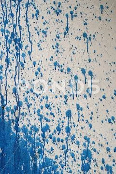 Blue splash on cement wall texture background Stock Photo #86215795