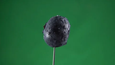 Blueberry rotating with loop on green sc... | Stock Video | Pond5