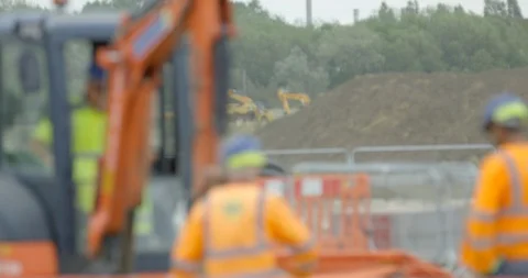 Blurred construction workers on site wit... | Stock Video | Pond5