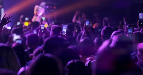 Blurred fans crowd dancing at pop band c... | Stock Video | Pond5