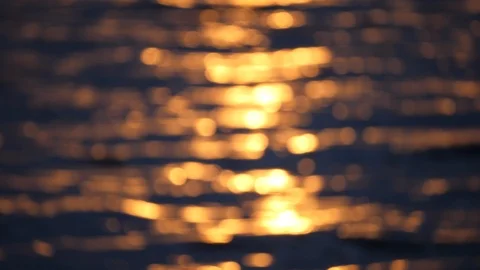 blurred gold yellow water wave with suns... | Stock Video | Pond5