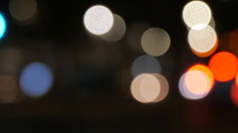 Blurred motion. Bright spots moving on b... | Stock Video | Pond5