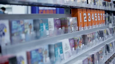 Blurred view of a DVD store aisle with a... | Stock Video | Pond5