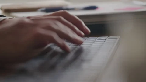 Blurry View Typing on a Keyboard | Stock Video | Pond5