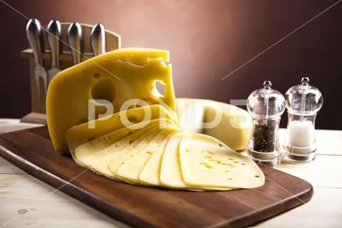 Board of cheese, saturated ambient rural theme Stock Photo #116693735