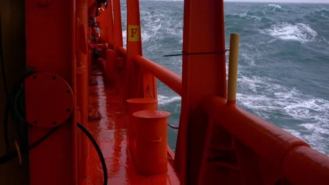 Board ship in storm. Red side of vessel,... | Stock Video | Pond5