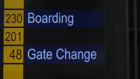 Boarding status gate change on airport t... | Stock Video | Pond5