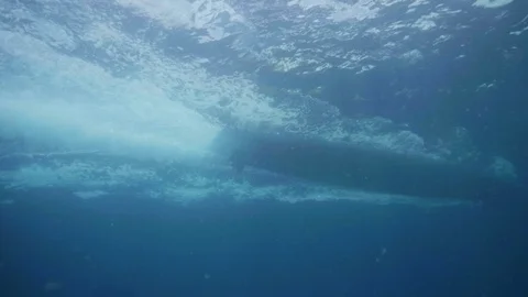 A boat moving on water surface underwate... | Stock Video | Pond5