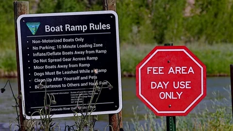 Boat Ramp and Fee Area Signs | Stock Video | Pond5