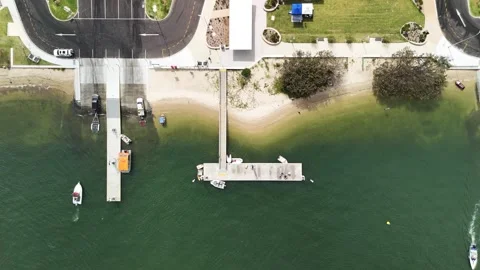 Boat ramp with a floating walkway and po... | Stock Video | Pond5