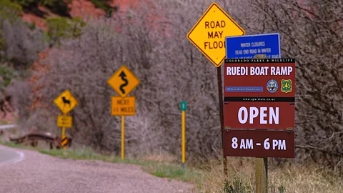 "Boat Ramp Open" Sign in National Forest | Stock Video | Pond5