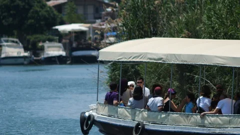 boat with roof floating on the river in ... | Stock Video | Pond5