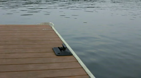Boat tie down on Dock of Lake | Stock Video | Pond5