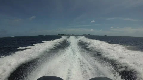 Boat wake with private island in the dis... | Stock Video | Pond5