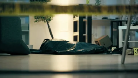 Body of dead person lying on floor cover... | Stock Video | Pond5