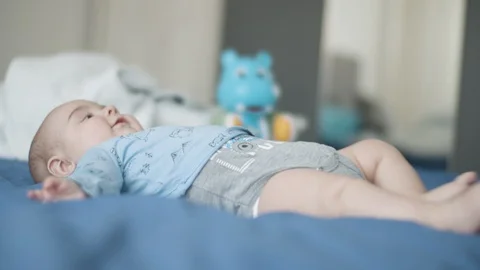 Body Reactions Of Happy Clean Baby Boy O... | Stock Video | Pond5