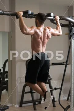 Bodybuilder Doing Pull Ups Best Back Exercises ~ Premium Photo #84050589