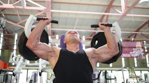 Bodybuilder trains on simulator for shou... | Stock Video | Pond5