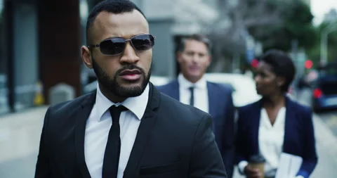 Bodyguard, business team walking in the ... | Stock Video | Pond5