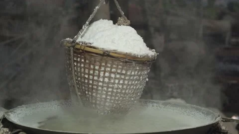 boiling saline solution in pan is tradit... | Stock Video | Pond5