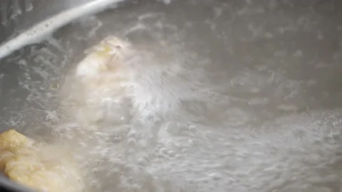 Boiling water with meat pieces of differ... | Stock Video | Pond5