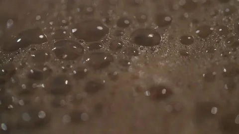 Boiling water in a pot bubbling over. bo... | Stock Video | Pond5