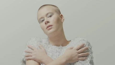 Bold caucasian pretty female model in wh... | Stock Video | Pond5