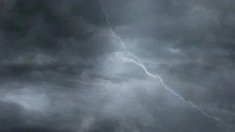 a bolt of lightning on a dark gray cloud... | Stock Video | Pond5