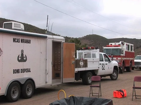 A bomb disposal squad uses a remote cont... | Stock Video | Pond5