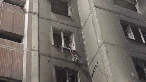 A bombed-out apartment building after an... | Stock Video | Pond5