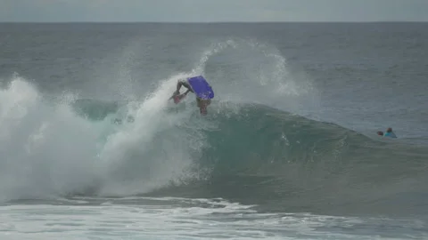 Boogie board bodyboard surfer surfing bi... | Stock Video | Pond5