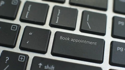 Book appointment button on computer keyb... | Stock Video | Pond5