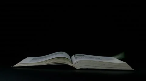 book page turning on black background 4k... | Stock Video | Pond5