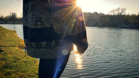 BOOM UP following the hand of a young la... | Stock Video | Pond5