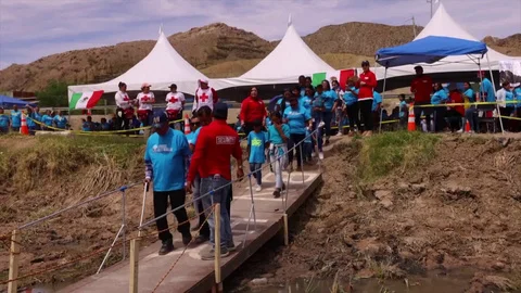 Border hugs: families separated by US-Me... | Stock Video | Pond5