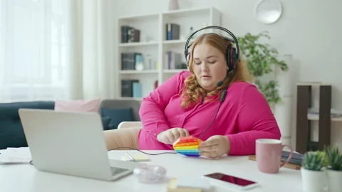 Bored call center worker talking to clie... | Stock Video | Pond5