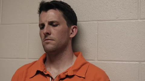 Bored, tired, unhappy man. Prison inmate... | Stock Video | Pond5