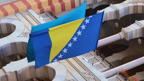 Bosnian flag waving in the wind on a pol... | Stock Video | Pond5